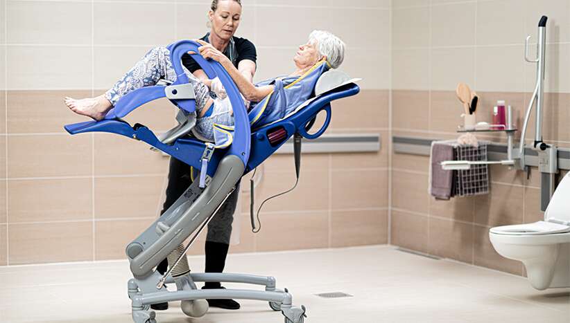 ArjoHuntleigh Carendo Multipurpose Hygiene Chair — Medsupplynow